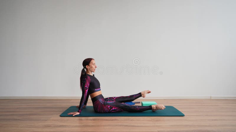 Athletic Woman Trainer Leads an Online Stretching Workout. Concept E ...