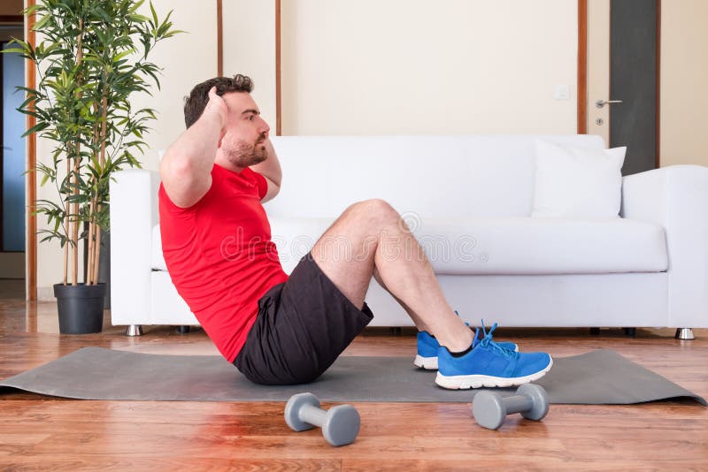 Man Doing Body Exercise and Working Out at Home Stock Image - Image of ...