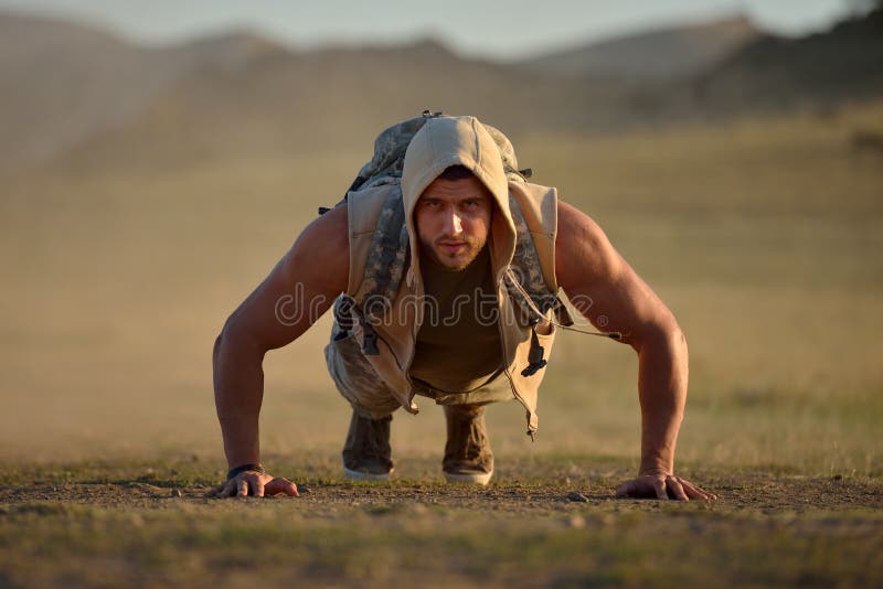 Athletic Young Man Exercising Outdoor on Dusty Field Stock Image ...