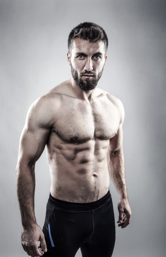 Athletic Young Man with Muscles Stock Photo - Image of athletic, pack ...