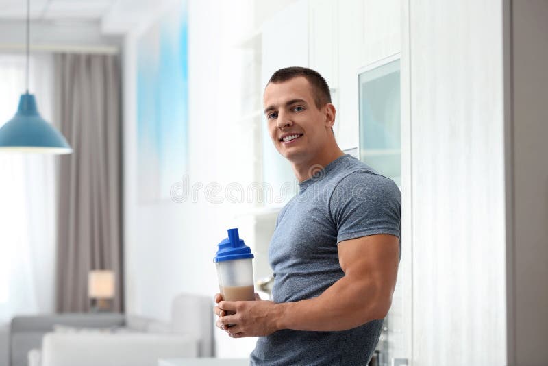 Athletic Young Man with Protein Shake in Stock Photo - Image of healthy ...