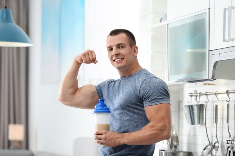 Athletic Young Man with Protein Shake in Stock Image - Image of ...