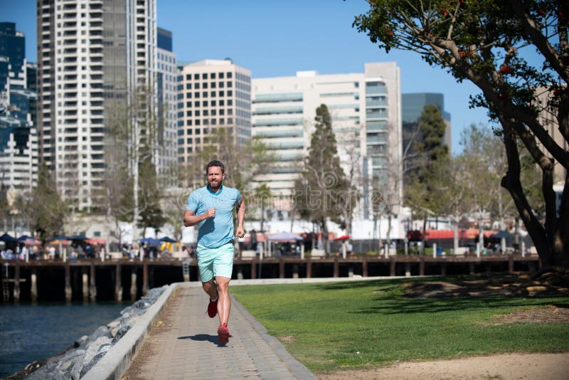 Athletic Young Man Running in the City Nature. Stock Photo - Image of ...