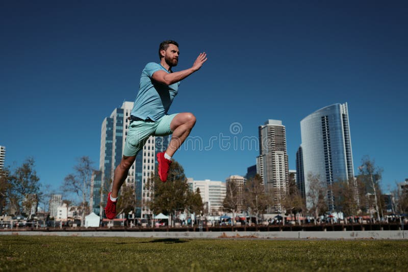 Athletic Young Man Running in the Nature. Dynamic Movement. Stock Image ...