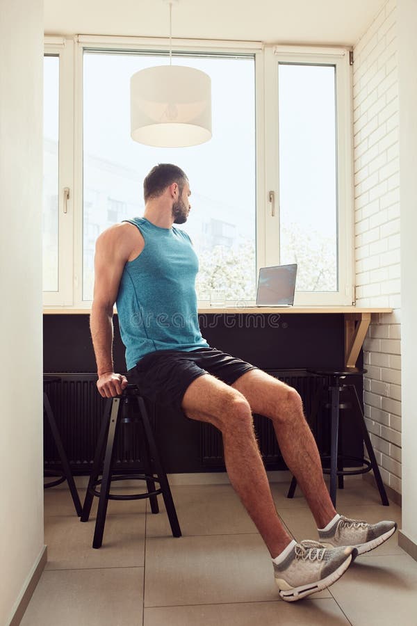 Athletic Young Man Using Laptop during Morning Workout Stock Image ...