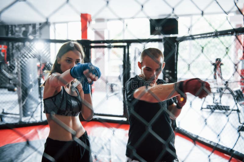 Athletic Young People Have daily Exercise on the Boxing Ring Stock ...