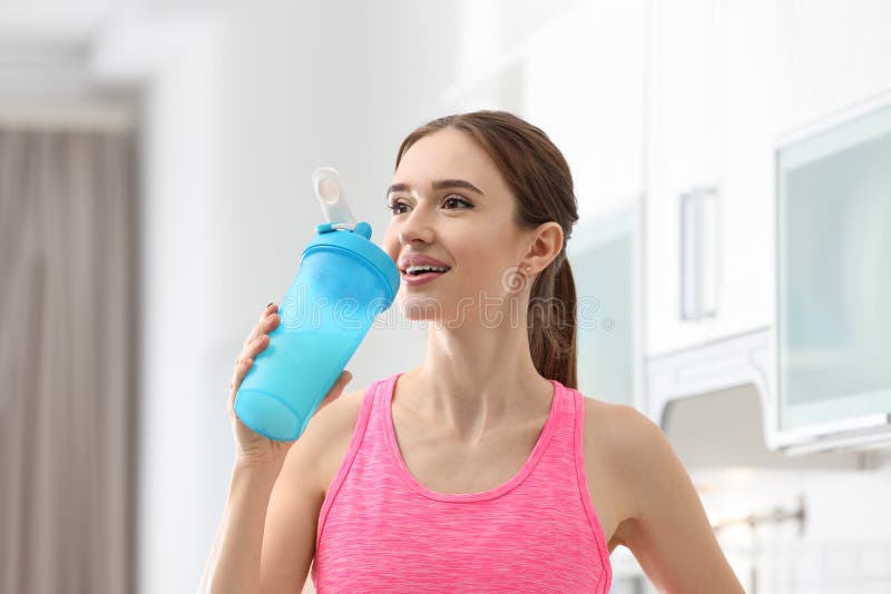Athletic Young Woman Drinking Protein Shake Stock Image - Image of ...