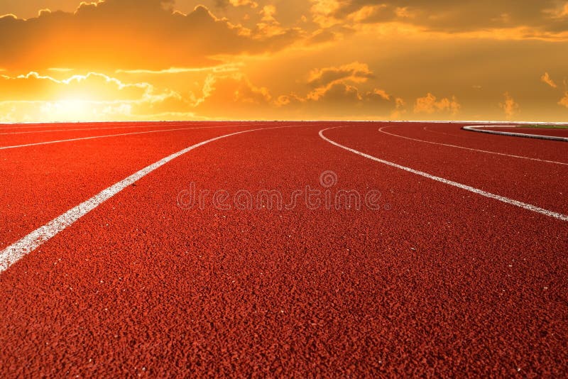 Athletics Stadium Running Track Curve and Sunlight on Orange Sky Stock ...