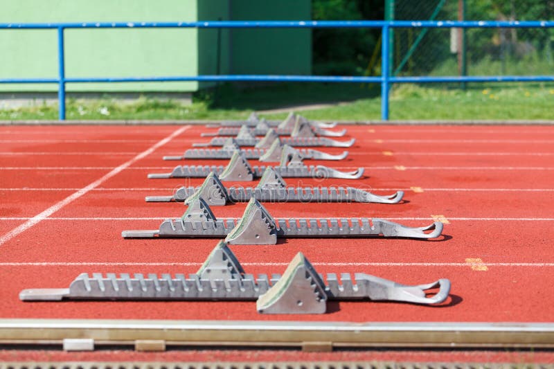 Athletics Starting Blocks on Race Red Track Stock Image - Image of race ...