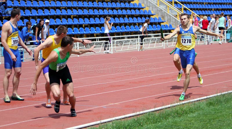 Boys run relay race editorial stock image. Image of athletes - 23599819