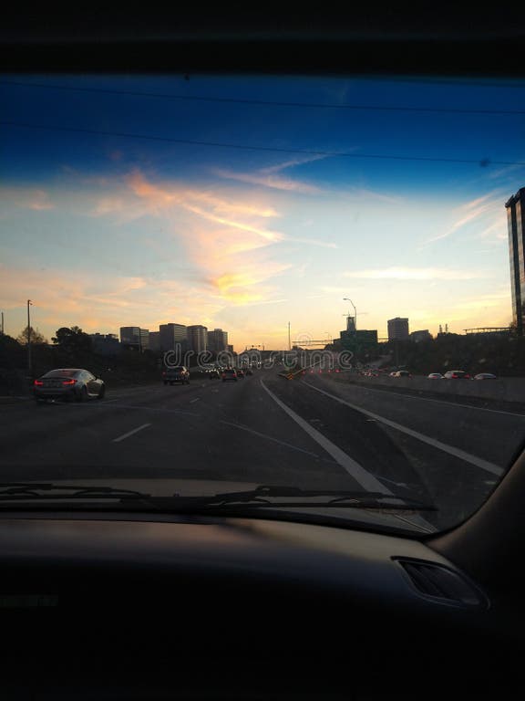 Atl sunset drive stock image. Image of line, vehicle - 204574555