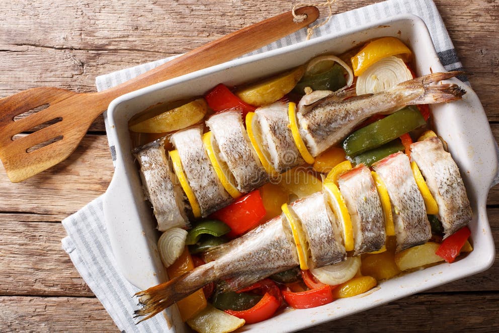 Atlantic Cod Baked with Vegetables in a Baking Dish Close Up. Ho Stock ...