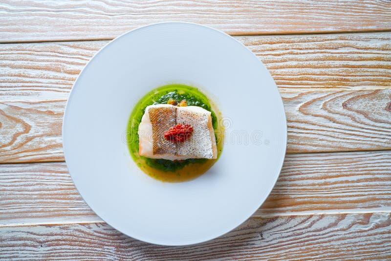 Atlantic Hake Over Dried Tomato Ratatouille Stock Image - Image of ...