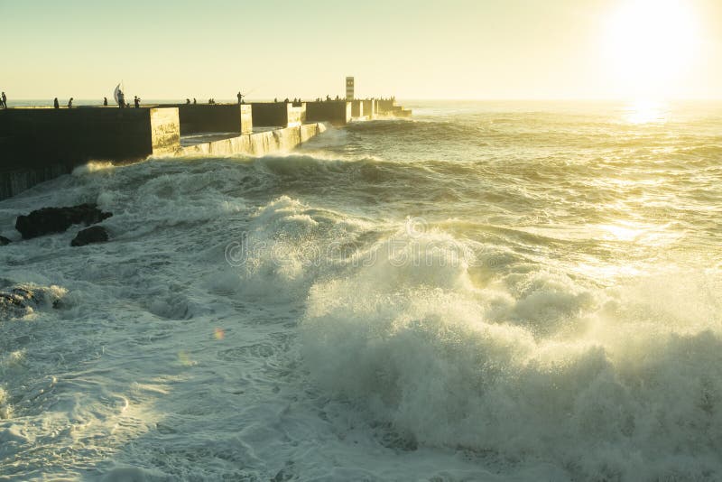 Atlantic Pier with a Wave of Surf at Sunset. Stock Photo - Image of ...