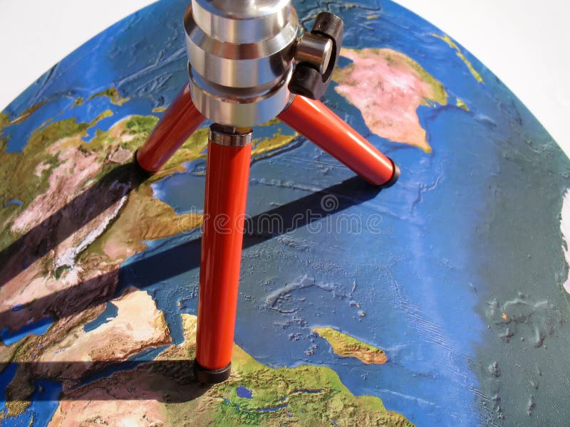 Atlas map and photo tripod stock photo. Image of photograph - 1222660