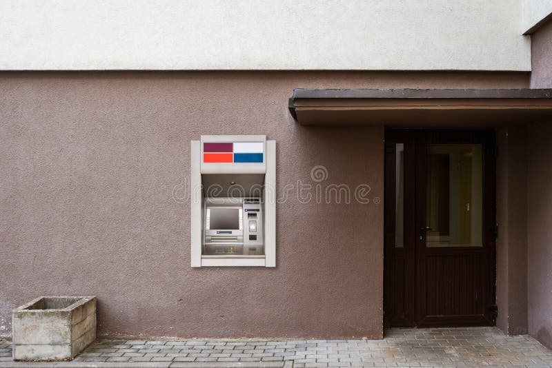ATM built into a wall stock image. Image of commercial - 197468089