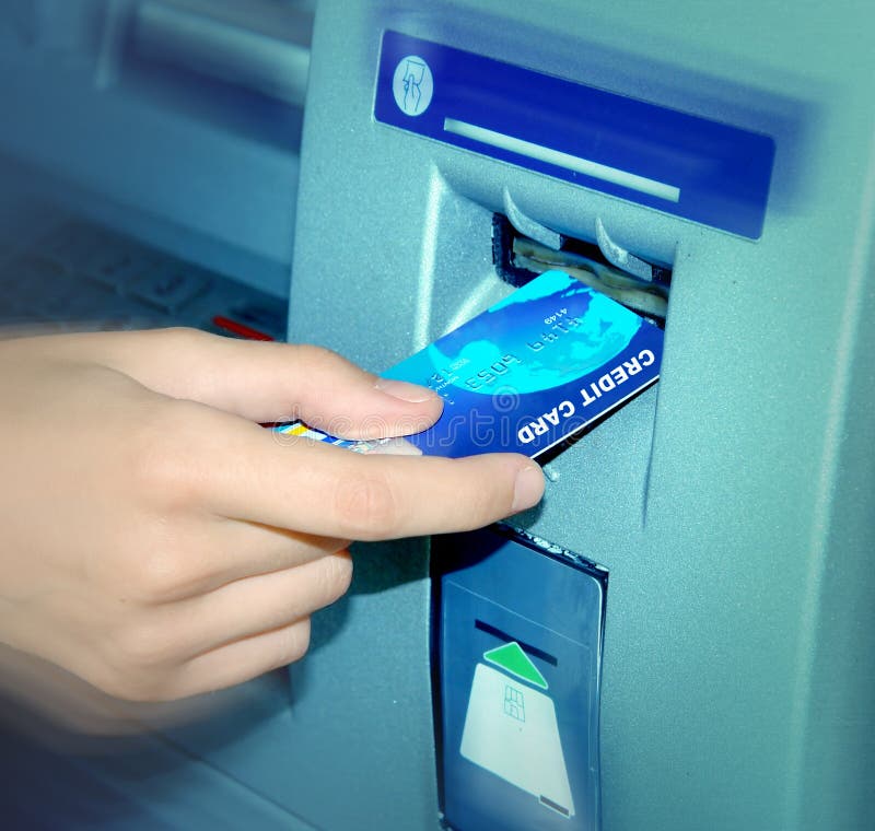 ATM. Inserting a Card. stock image. Image of electronic - 1203117