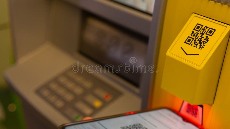 ATM Reading the QR Code from a Smartphone, Close-up. Stock Image ...