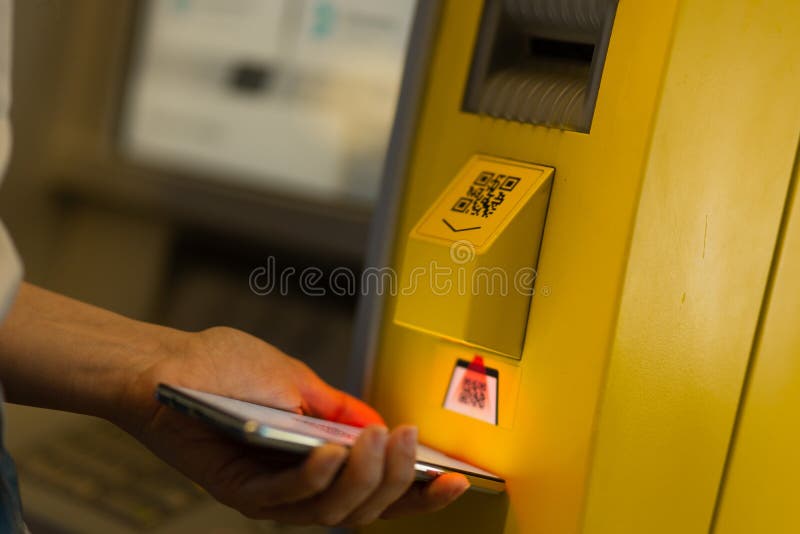 ATM Reading the QR Code from a Smartphone, Close-up. Stock Photo ...