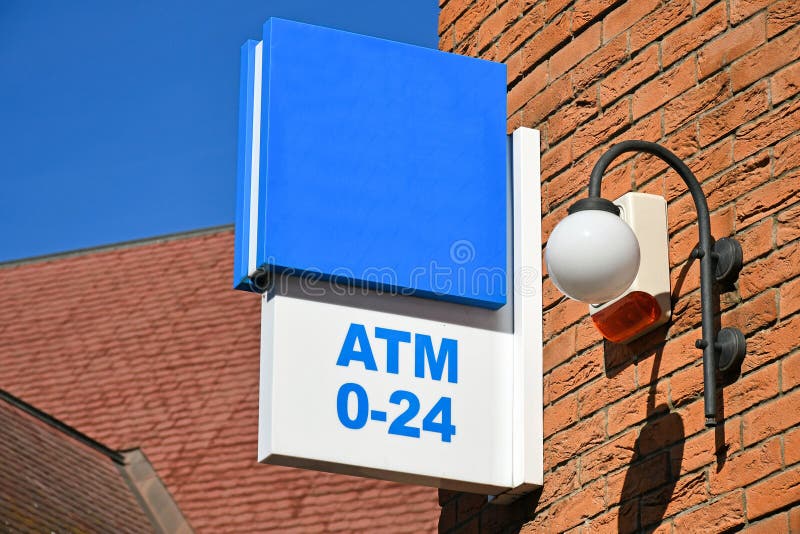 ATM Sign on the Wall of the Bank Building Stock Photo - Image of lamp ...