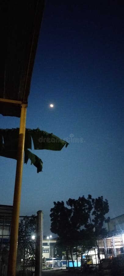 The Atmosphere of the Building Area Under the Night Sky with Beautiful ...