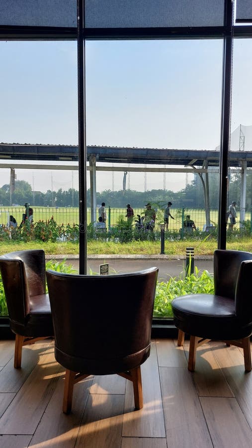 The Atmosphere in a Corner Cafe with Views of the Outside Driving Range ...