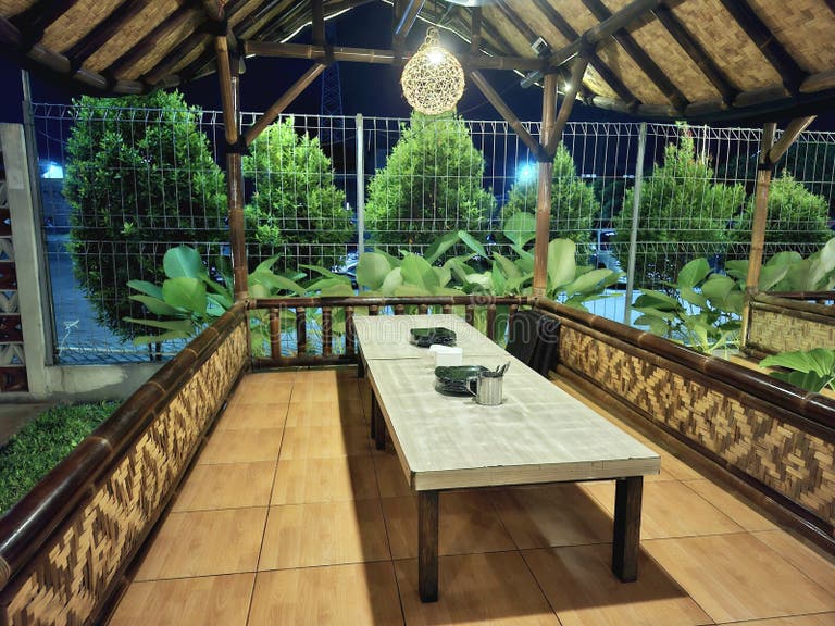 The Atmosphere of a Rectangular Gazebo Dining Area with a Modern ...