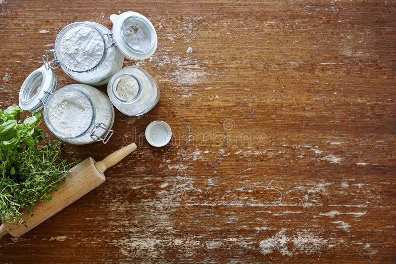 Atmospheric Kitchen Scene with Flour on Wooden Table Stock Photo ...