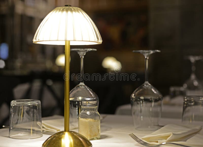 Table Setting in Restaurant in the Evening Stock Photo - Image of copy ...