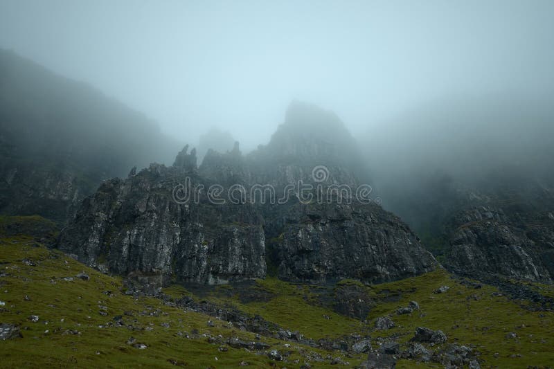 Atmospheric View of High Sharp Cliffs Covered in Fog Stock Photo ...