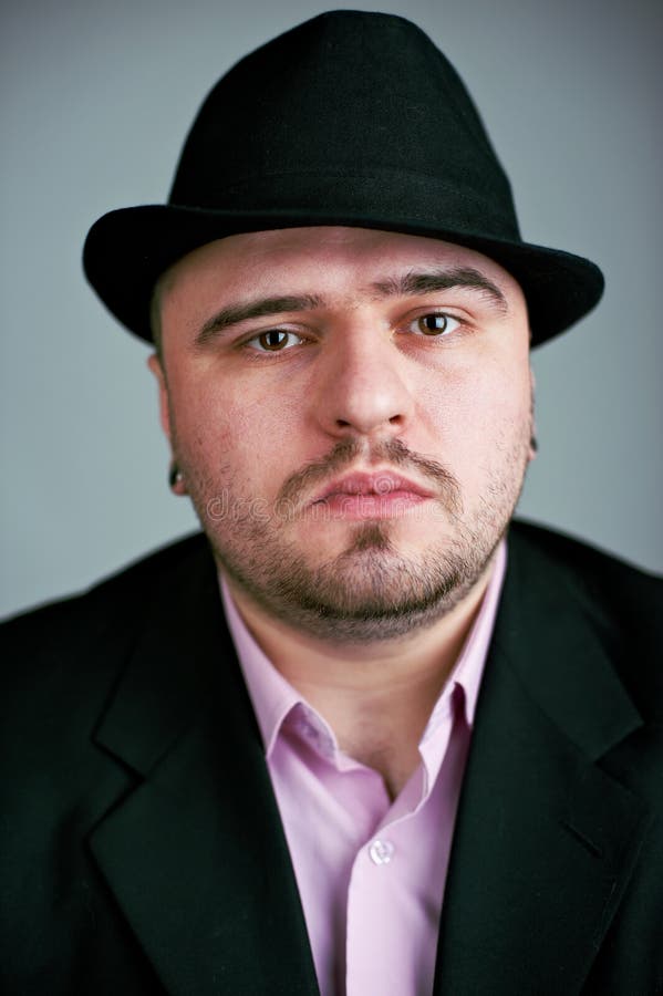 Atrractive Man in Black Hat Stock Photo - Image of crime, danger: 18670234