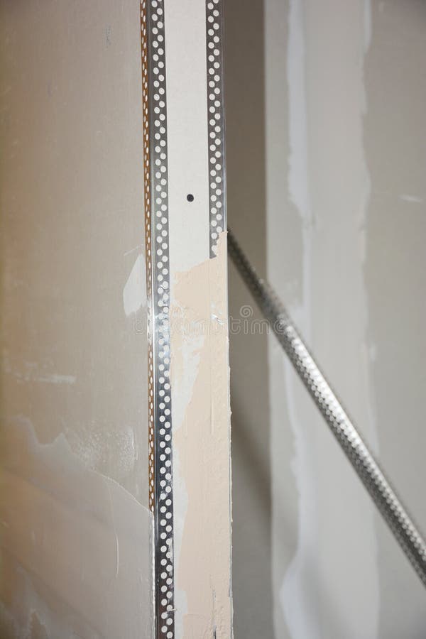Attaching Angle Beads To the Plasterboard, Dry Wall To Form a Perfect ...