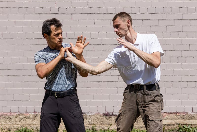 The Attacker Grabs the Opponent by the Clothes. Acceptance of Exemption ...