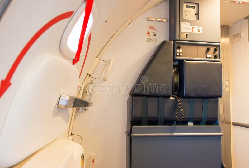 Attendant seat at airplane stock photo. Image of side - 28038752