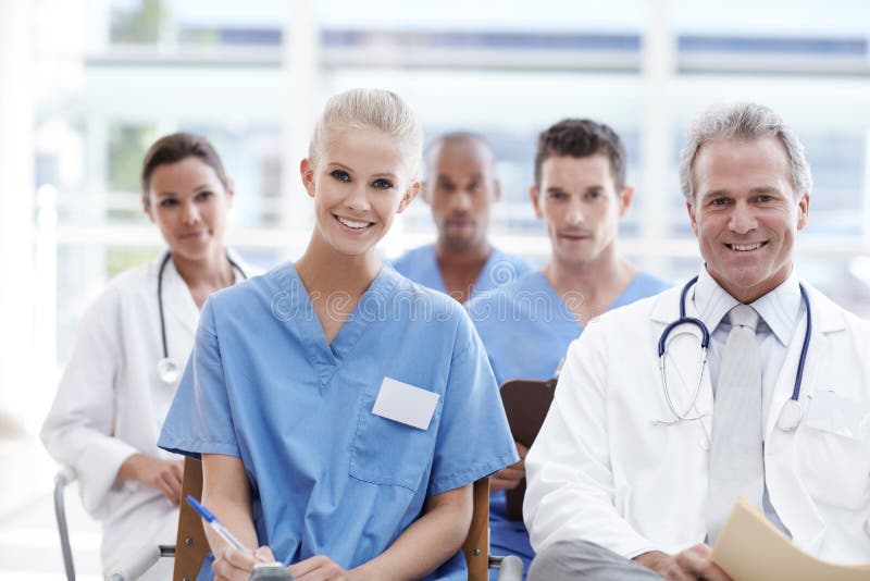 Attending a Medical Seminar. Doctors and Nurses in a Seminar Together ...