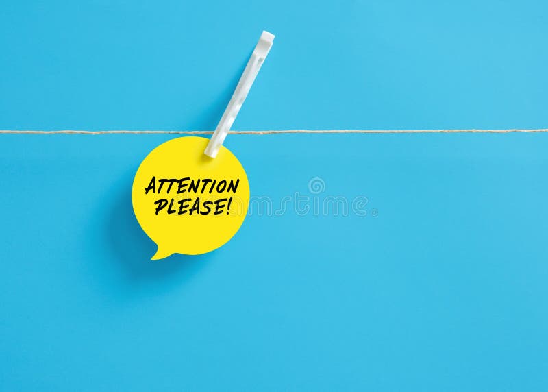 Attention Please Message on a Speech Bubble Hanging on Clothesline with ...
