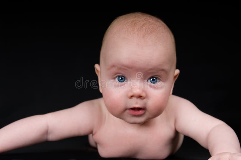 Attentive baby boy stock image. Image of emotion, pose - 10185785