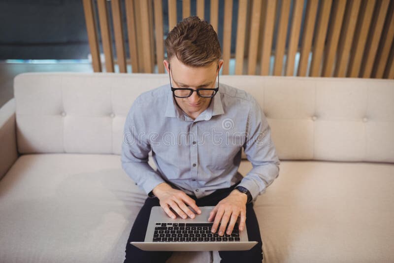 Attentive Executive Using Laptop at Desk Stock Image - Image of ...