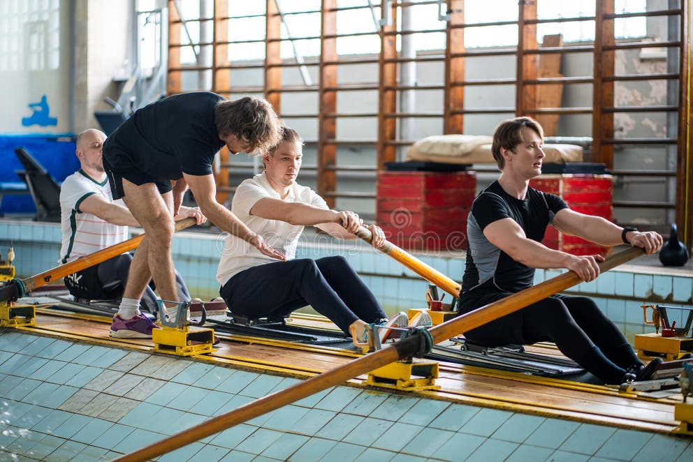 Attentive Experienced Coach Instructs Rower Crew, Correcting Posture ...