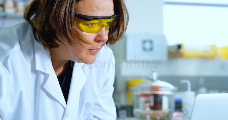 Attentive Female Scientist Experimenting in Laboratory 4k Stock Image ...