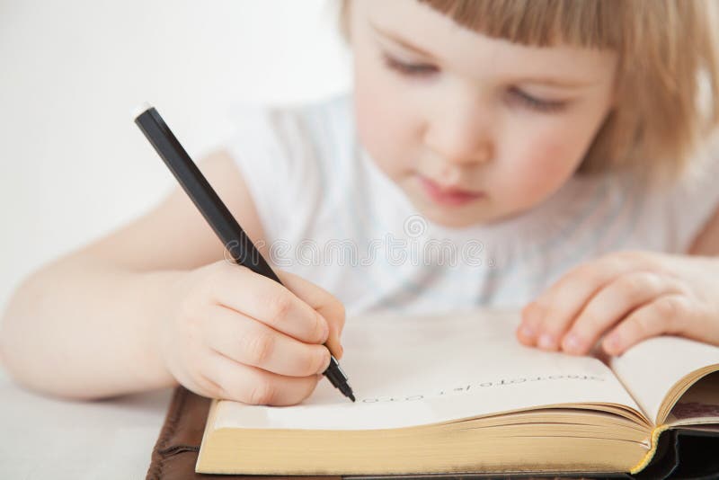 Attentive Little Girl Writing Letters Stock Photo - Image of page, copy ...