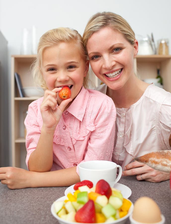 Mother with Daughter Eating Apples Stock Image - Image of home, health ...