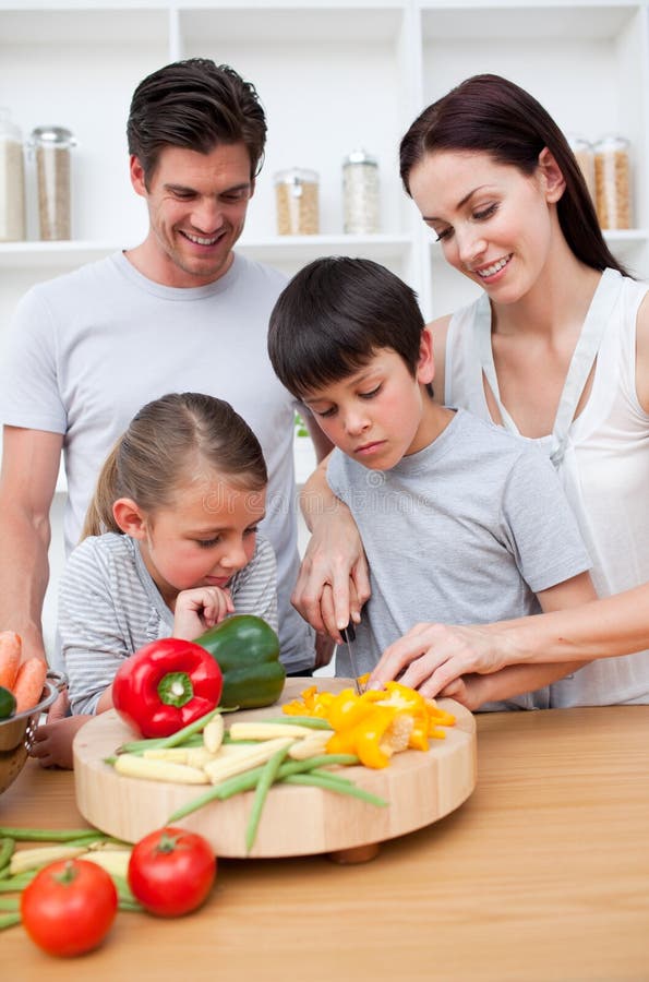Attentive Parents Cooking with Their Children Stock Image - Image of ...