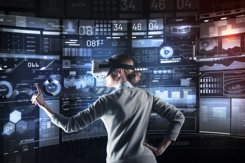 Attentive Programmer Smiling and Pointing To the Screen while Being at ...