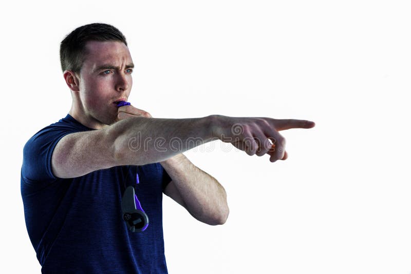 An Attentive Trainer Blowing His Whistle Stock Photo - Image of ...