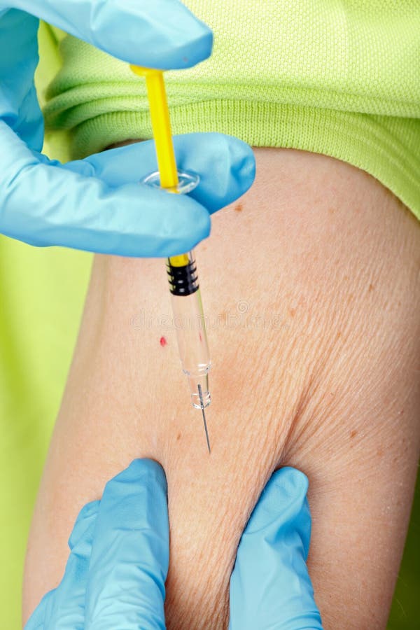 Doctor needle injection stock image. Image of injection - 5791139