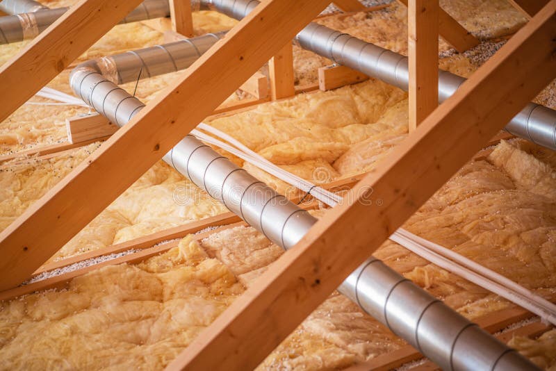 Attic Insulation and Ventilation during Construction Stock Photo ...