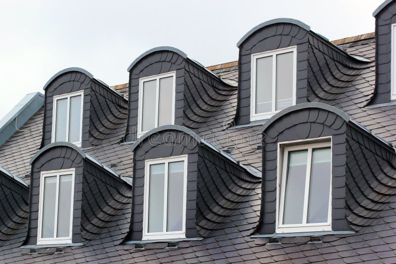 Attic Windows on the Roof of an Old Building Stock Photo - Image of ...