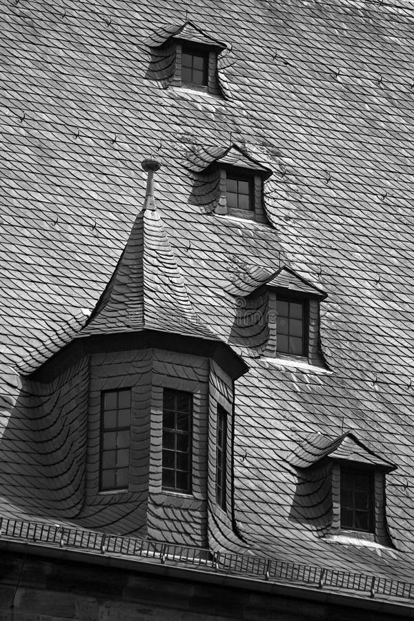 Attic Windows in Slate Roof Stock Image - Image of spire, ornate: 1532533
