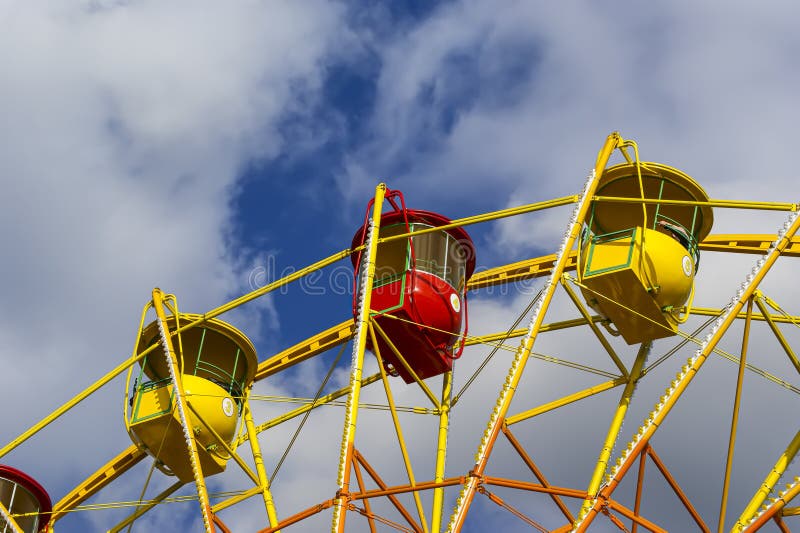 Attraction Carousel Ferris Wheel on the Background of the Cloudy Sky ...